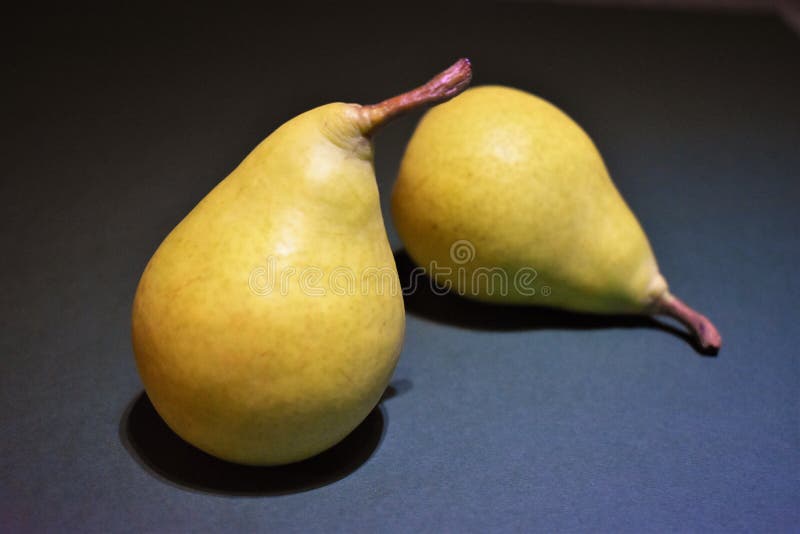 Two Yellow Pears on Black Ground Stock Image - Image of beautiful ...