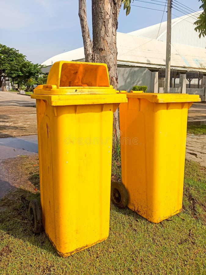 Two Yellow Trash Bins in the Public Park, Stock Photo - Image of park ...