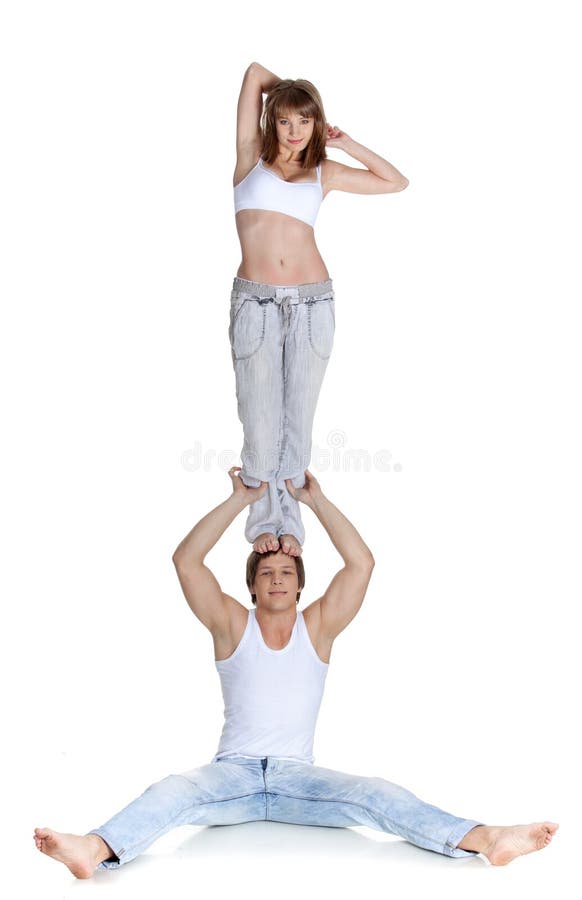 Two young acrobats. stock photo. Image of fitness, action - 18931202