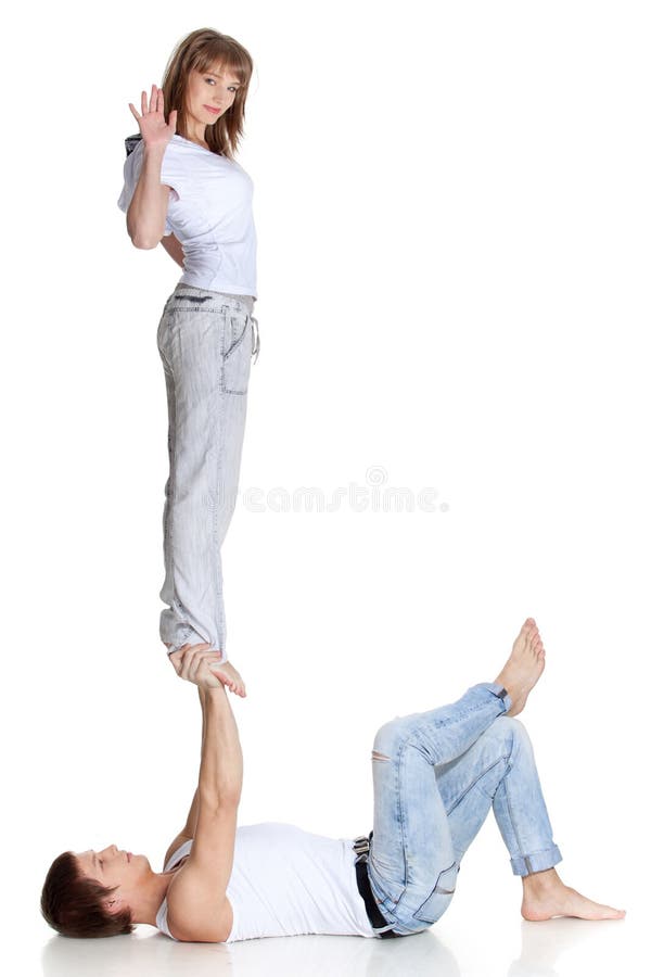 Two young acrobats. stock photo. Image of fitness, action - 18931202