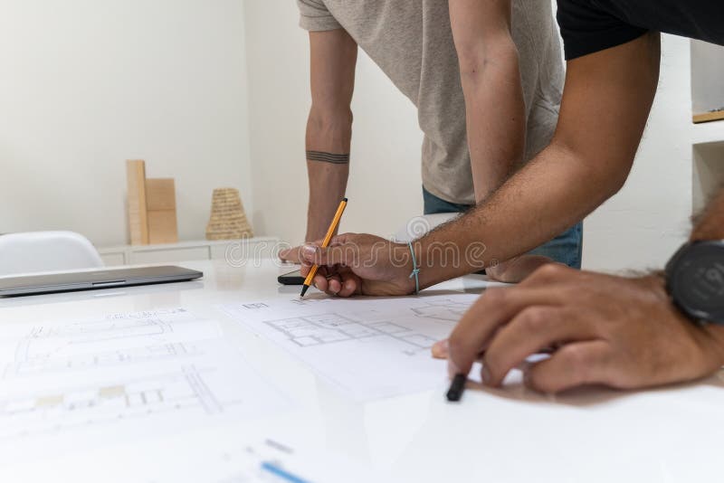Two Young Architects Working in Their Studio on a Project Stock Image ...