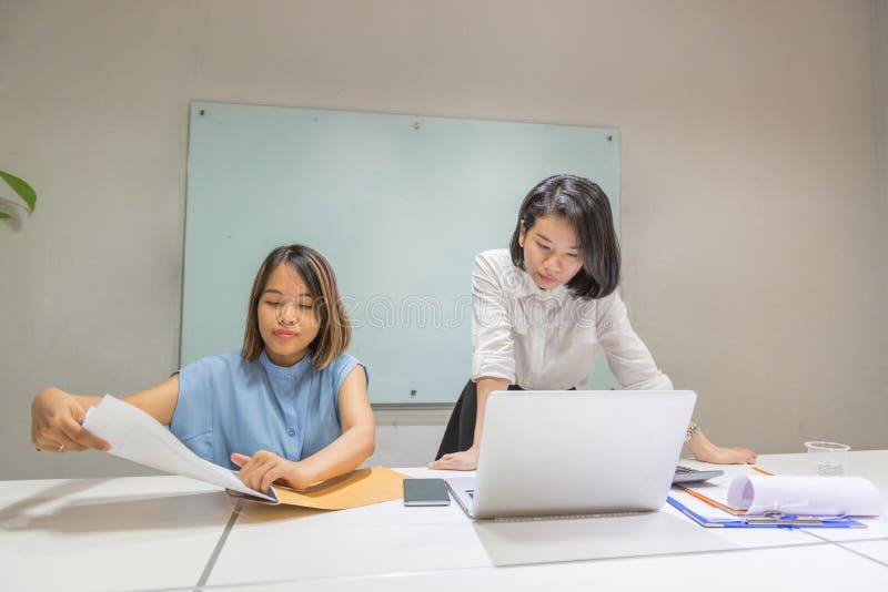 Two Young Asian Employee Working in the Office Stock Image - Image of ...