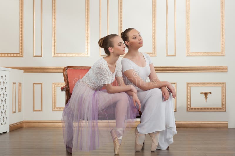 Two Young Beautiful Ballet Dancers Sitting on Sofa Stock Photo - Image ...