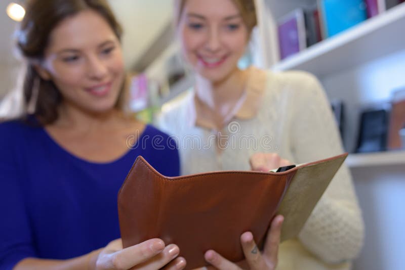 Two Young Beautiful Girls in Bookstore Stock Photo - Image of pretty ...