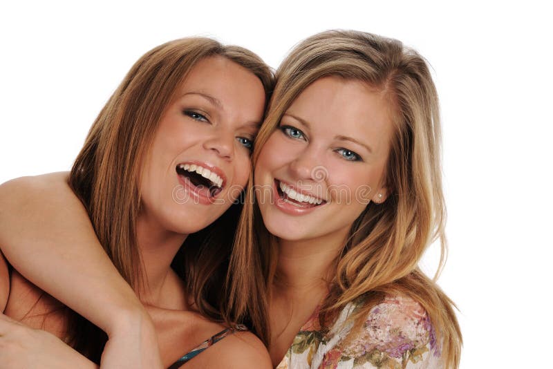 Two Young Beautiful Sisters Smiling Stock Photo - Image of isolated ... Two Young Beautiful Sisters Smiling Stock Photo - Image of isolated ...