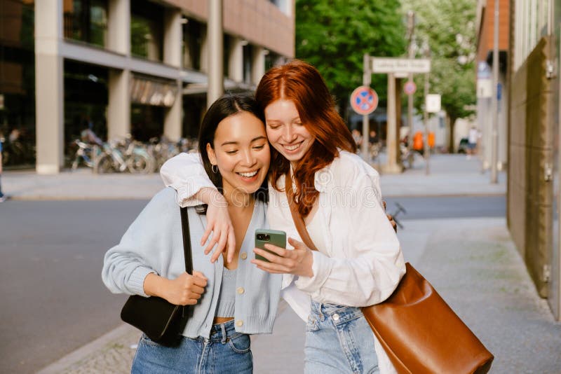 Two Young Beautiful Smiling Happy Girls Hugging Each Other Stock Image ... Two Young Beautiful Smiling Happy Girls Hugging Each Other Stock Image ...