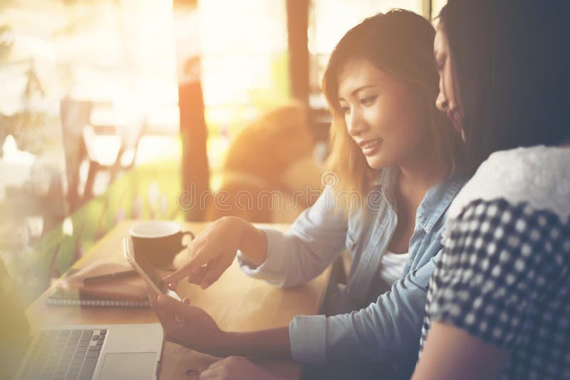 Two Young Beautiful Women Chatting in a Coffee Shop. Stock Image ...
