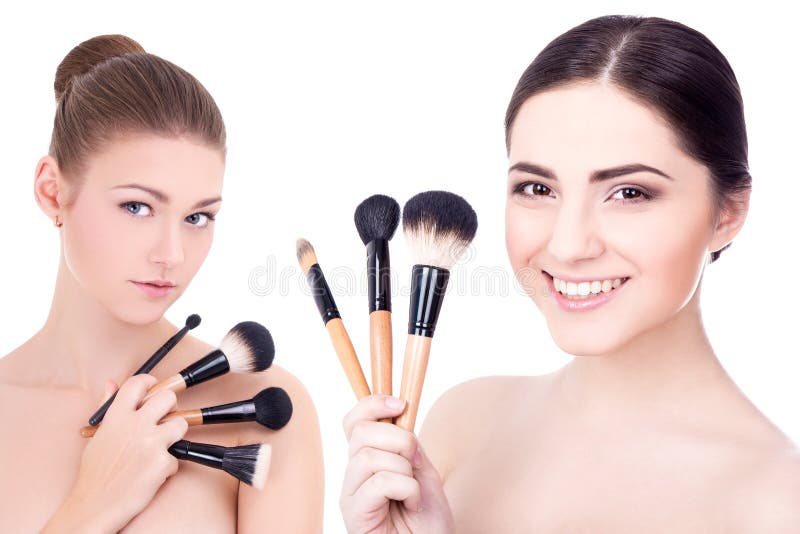 Two Young Beautiful Women with Make Up Brushes Isolated on White Stock ...