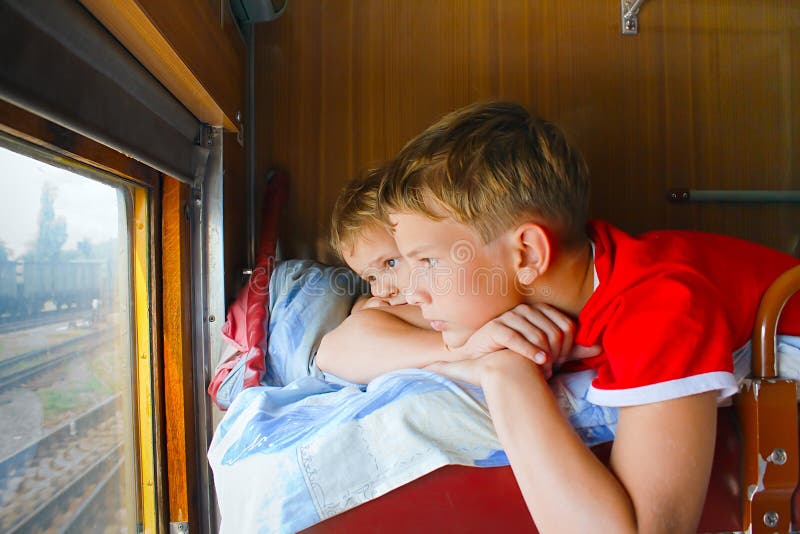 Two young boy in a train stock photo. Image of motion - 20853300