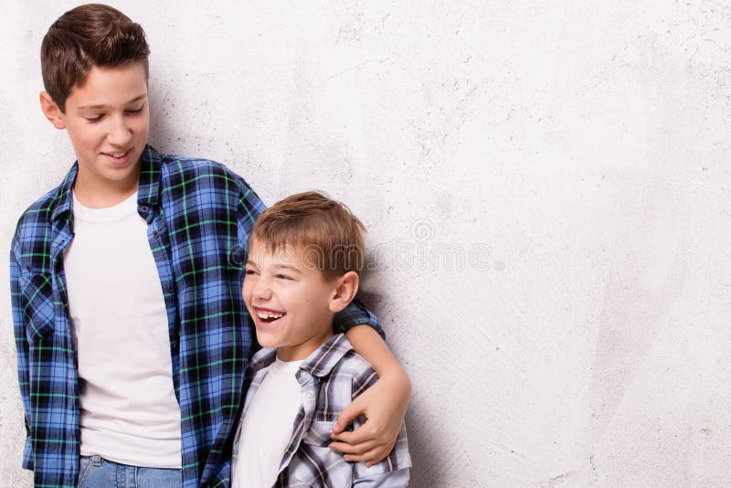 Two young brothers posing. stock image. Image of female - 80169163