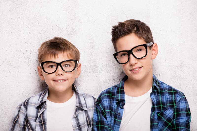 Two young brothers posing. stock photo. Image of nice - 80169286