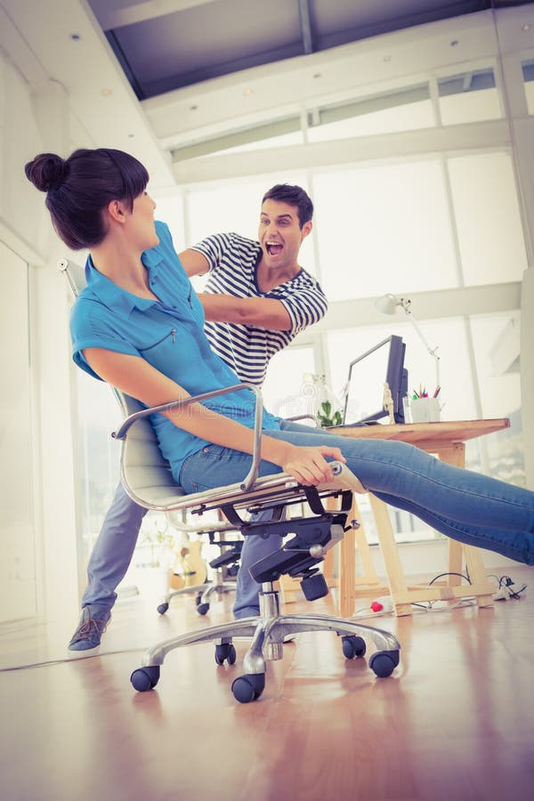 Two Young Business Colleagues Having Fun Stock Image - Image of group ...