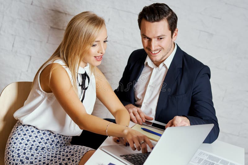 Man and Woman Work Together in the Office Stock Image - Image of ...