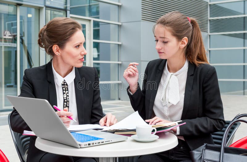 Two young business women stock photo. Image of brainstorming - 60773952