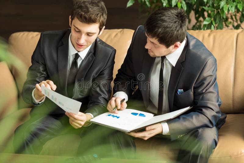 Two Young Businessmen Discussing Project Stock Image - Image of ...