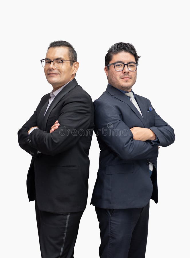 Two Young Businessmen Posing Back To Back, Looking at the Camera on a ...