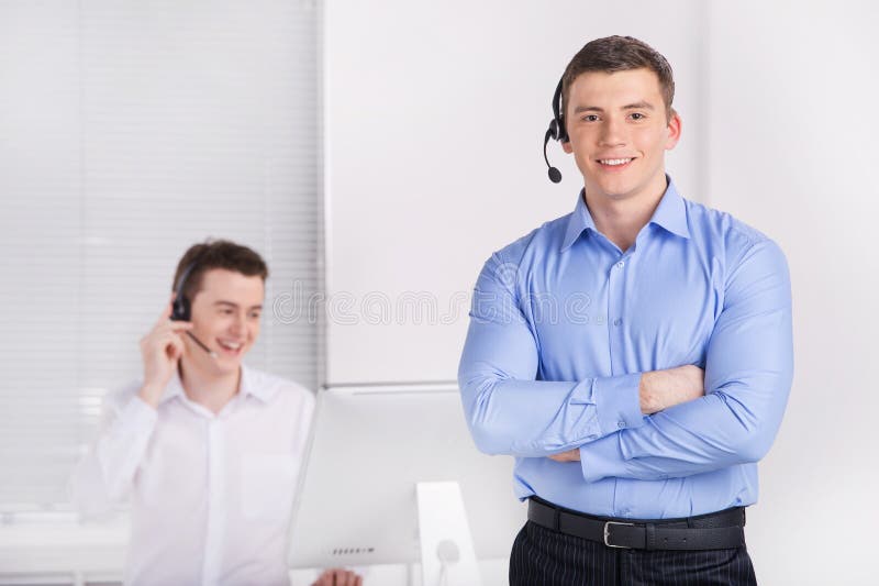 Two Young Call Center Men Talking by Phone. Stock Photo - Image of help ...