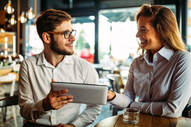 Two Young Colleagues Chatting Together on a Break Stock Image - Image ...