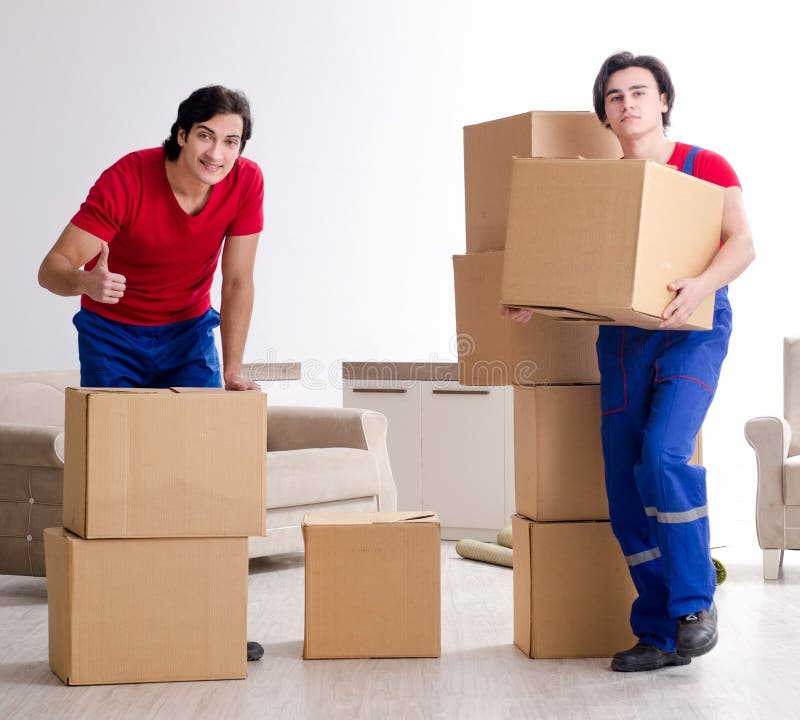 Two Young Contractor Employees Moving Personal Belongings Stock Image ...