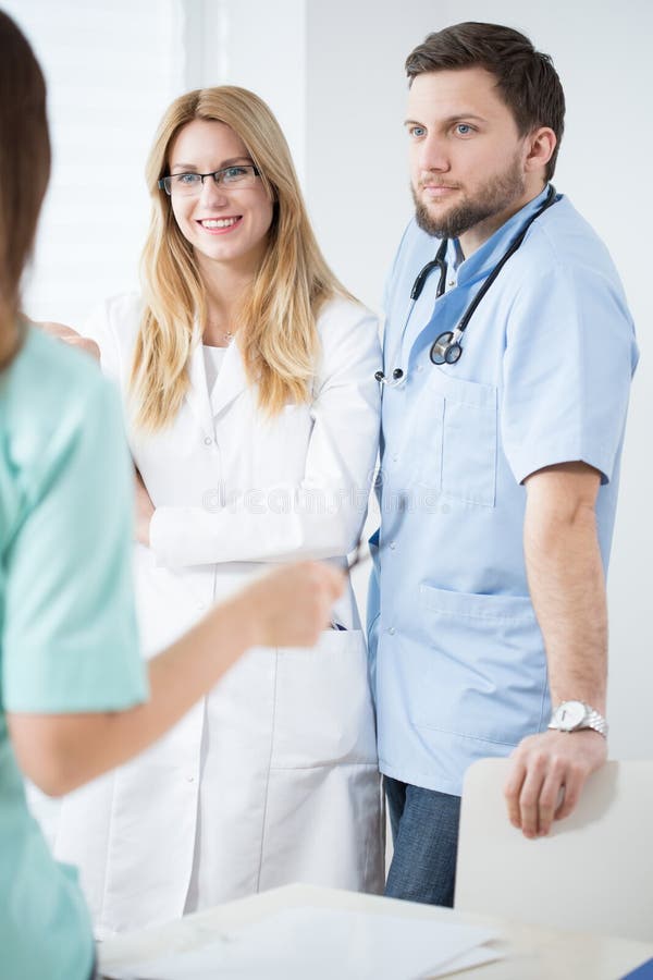 Two young doctors stock image. Image of office, medicine - 52632673