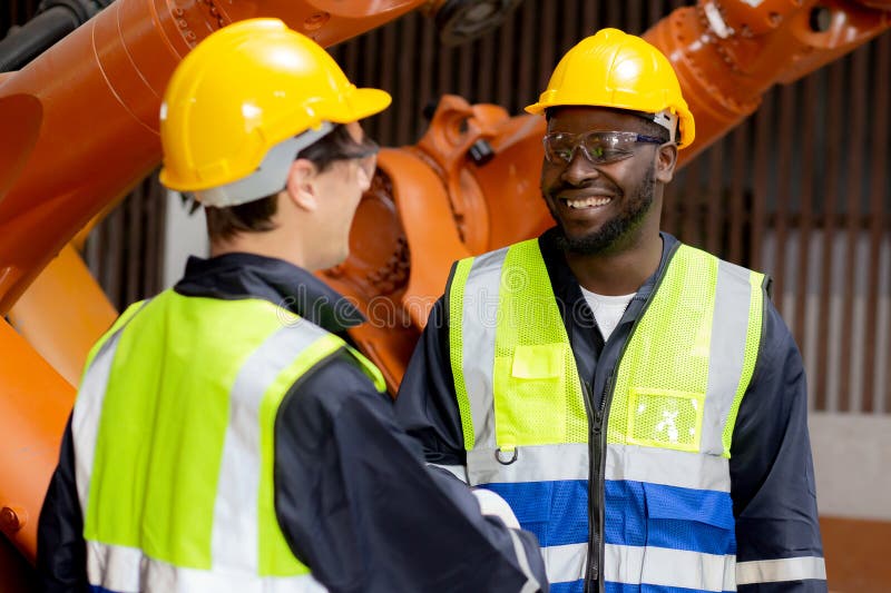 Two Young Engineer Man Handshake with Partner for Agreement while ...