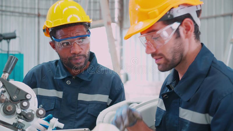 Two Young Engineer Man Talking and Explaining about Robot Arms ...