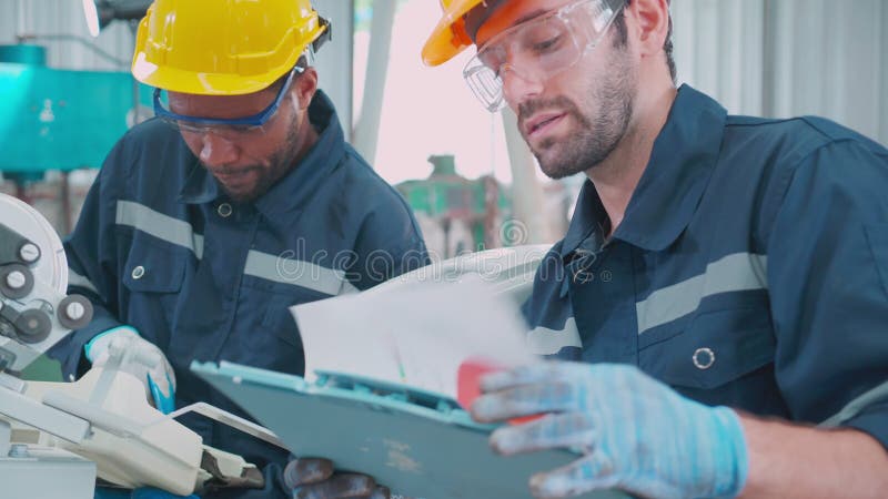 Two Young Engineer Man Talking and Explaining about Robot Arms ...
