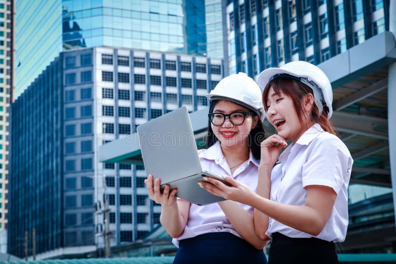 Two Young Engineers Take a Notebook Stock Image - Image of engineers ...