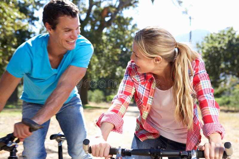Two Young Friends on a Bike Ride Stock Image - Image of horizontal ...