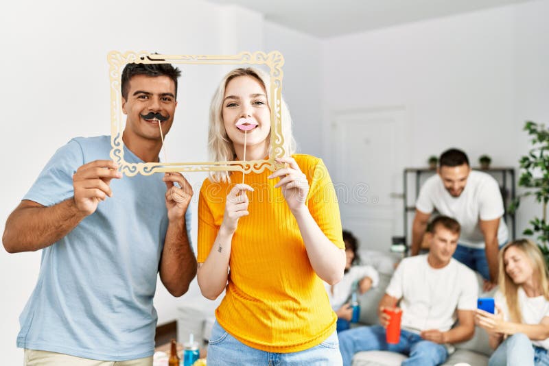 Two Young Friends Having Party Using Funny Costume Accessories at Home ...