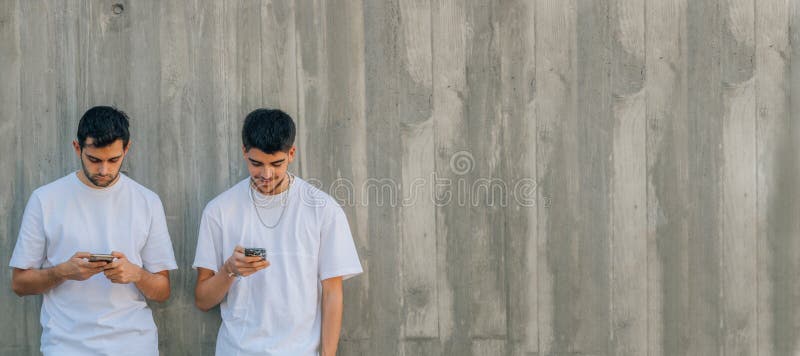 Two Young Friends on the Street with Mobile Stock Image - Image of ...
