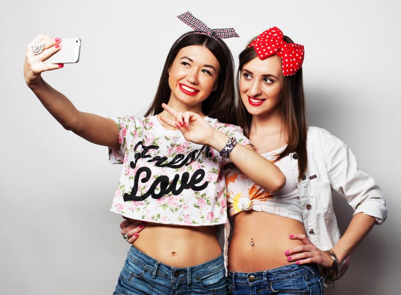 Two young funny women stock photo. Image of people, female - 54870254