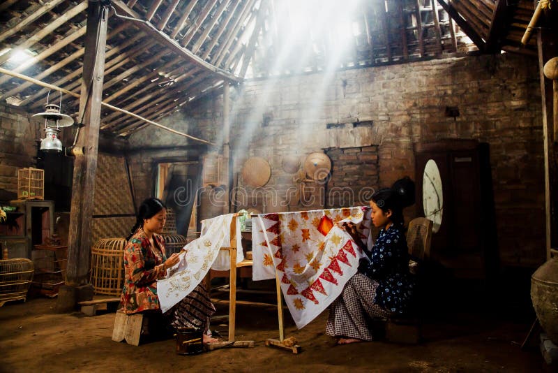 The Young Girl Showing the Traditional Javanese Batik Tulis that Will ...