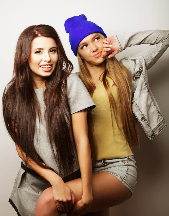 Two Young Girl Friends Standing Together and Having Fun Stock Image ...
