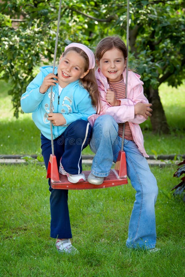 Two young girls stock image. Image of nature, smiling - 23305251