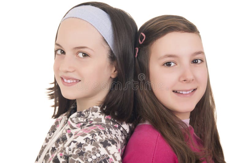 Two Young Girls Back To Back Smiling Stock Photo - Image of cheerful ...