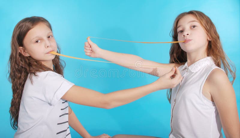 Two Young Girls Playing with Chewing Gum Stock Image - Image of beauty ...