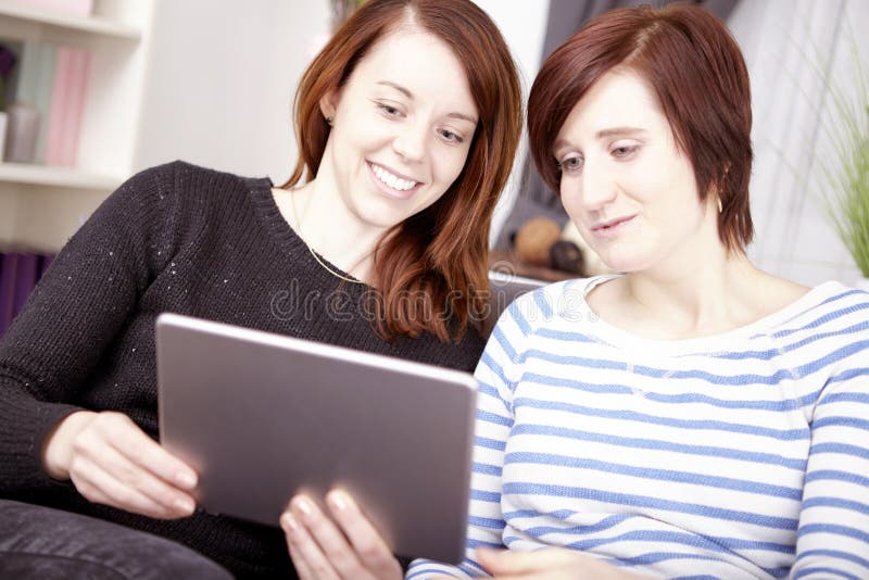 Two Young Girls with Tablet Computer Stock Image - Image of female ...