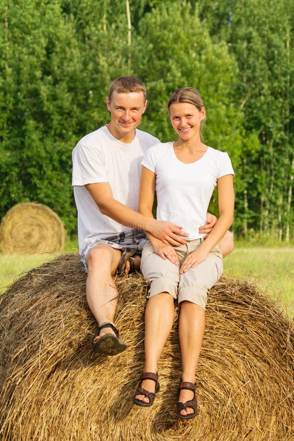Two Young Lovers on Haystack Stock Photo - Image of child, little: 35123266