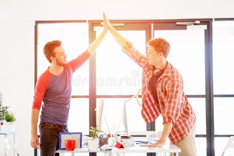 Two Young Man in Office Clapping Their Hands Stock Image - Image of ...