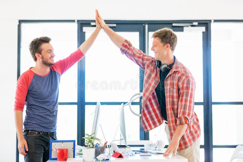 Two Young Man in Office Clapping Their Hands Stock Image - Image of ...