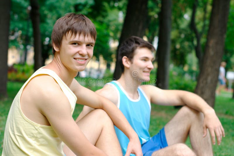 Two Young Man Resting at the Park Stock Image - Image of nutrition ...