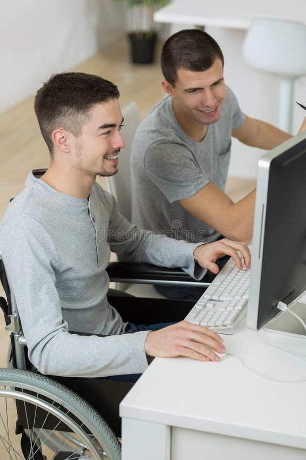 Two Young Men in Front Computer Stock Image - Image of profession, work ...