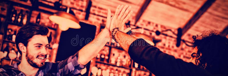 Two Young Men Giving High Five To Each Other Stock Photo - Image of ...