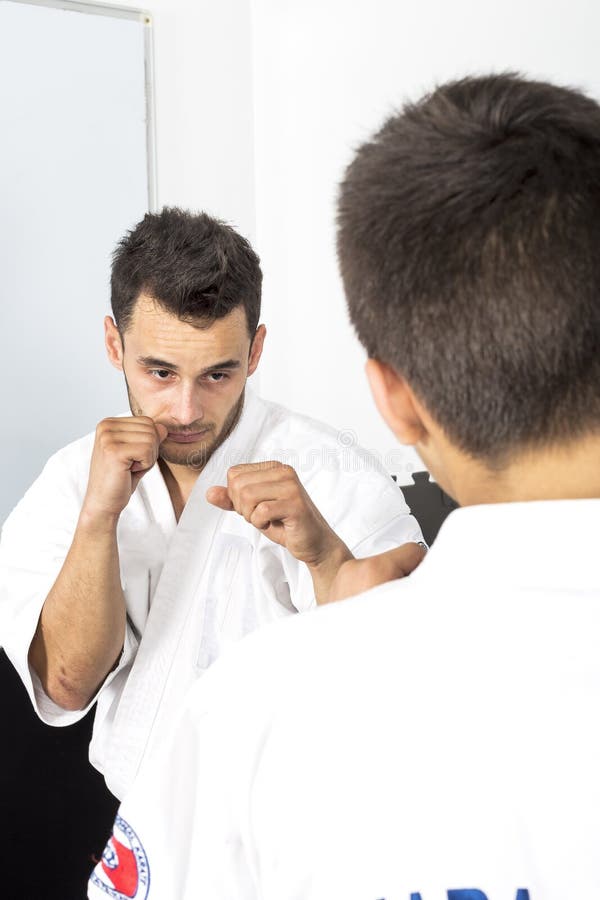Two Young Men in Kimono Fighting- Ashihara Karate-during Their T Stock ...