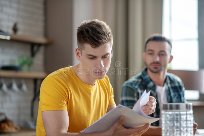 Two Young Men Working Together on the Project Stock Image - Image of ...