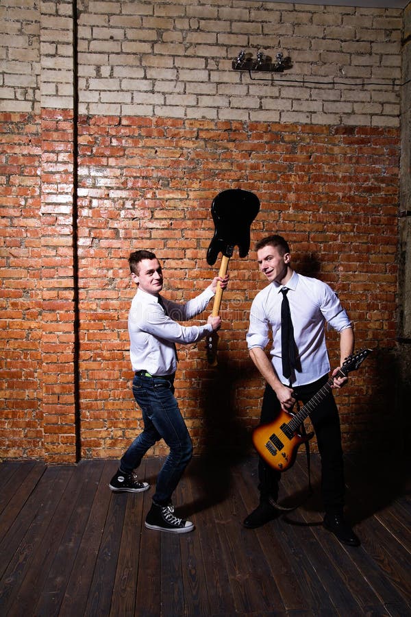 Two Young Musicians Having Fun with Guitar Stock Image - Image of ...