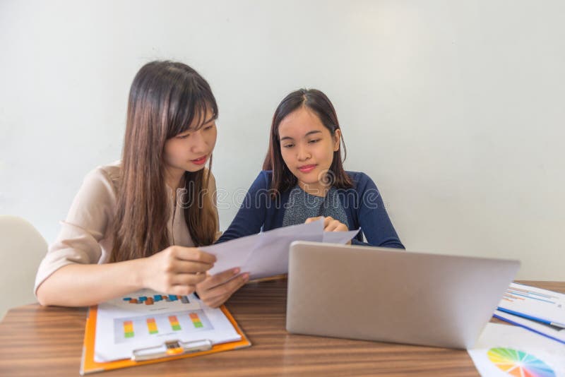 Two Young Office Woman Discussing about Financial Data Analysis Stock ...