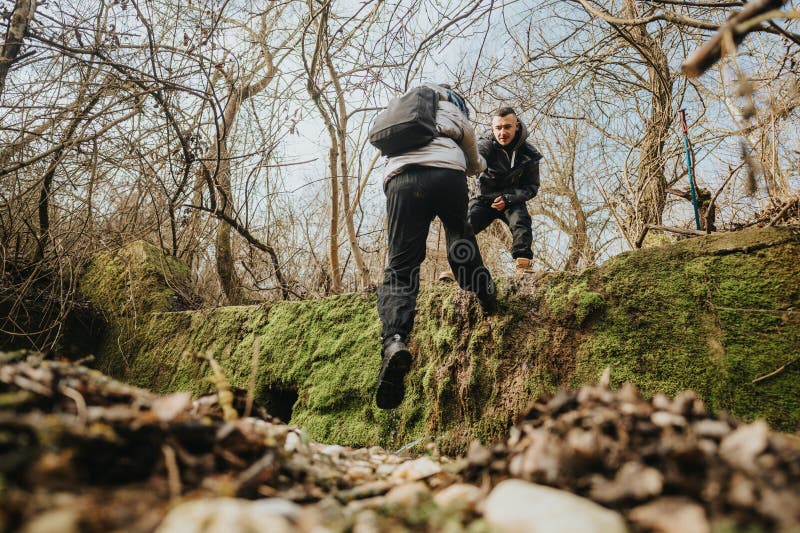 Two Young People Engaging in Outdoor Exploration within a Lush, Moss ...