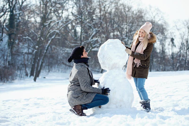 Two Young People Enjoying in the Snow Stock Photo - Image of space ...